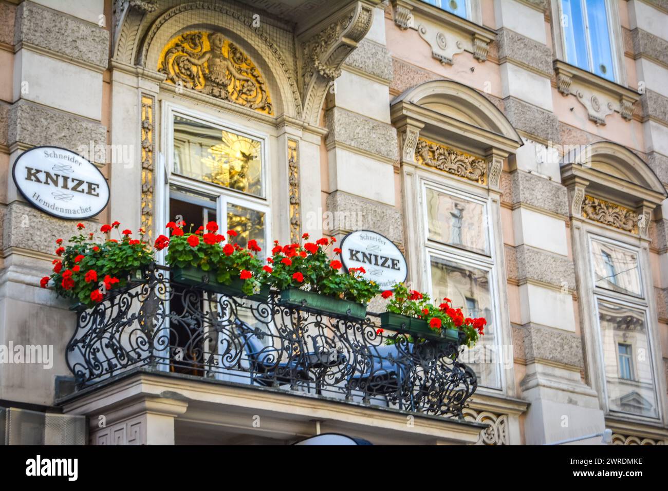Balcony whit roses on a beautiful building with gold details Stock ...