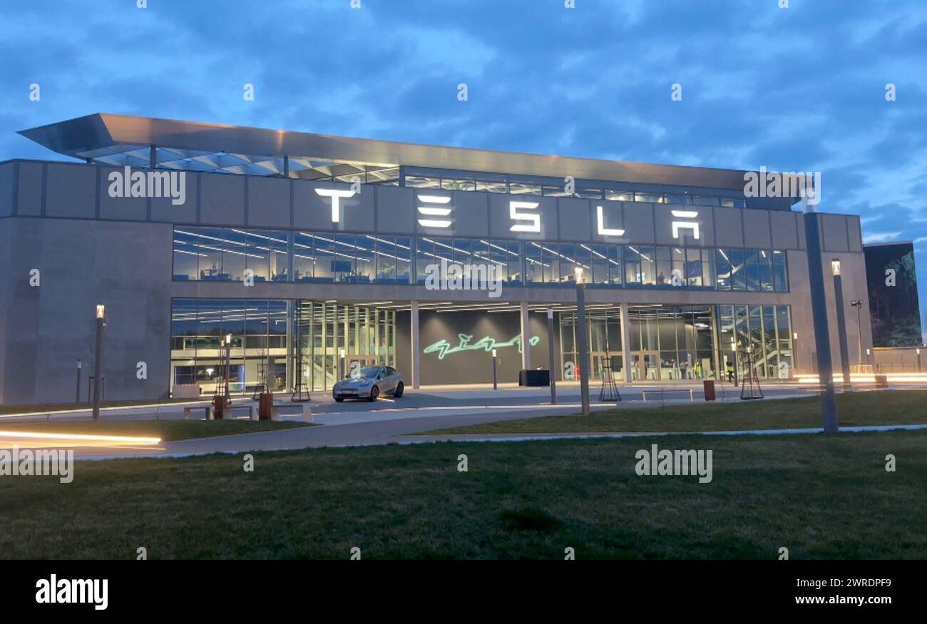 12 March 2024, Brandenburg, Grünheide: The illuminated "Tesla ...