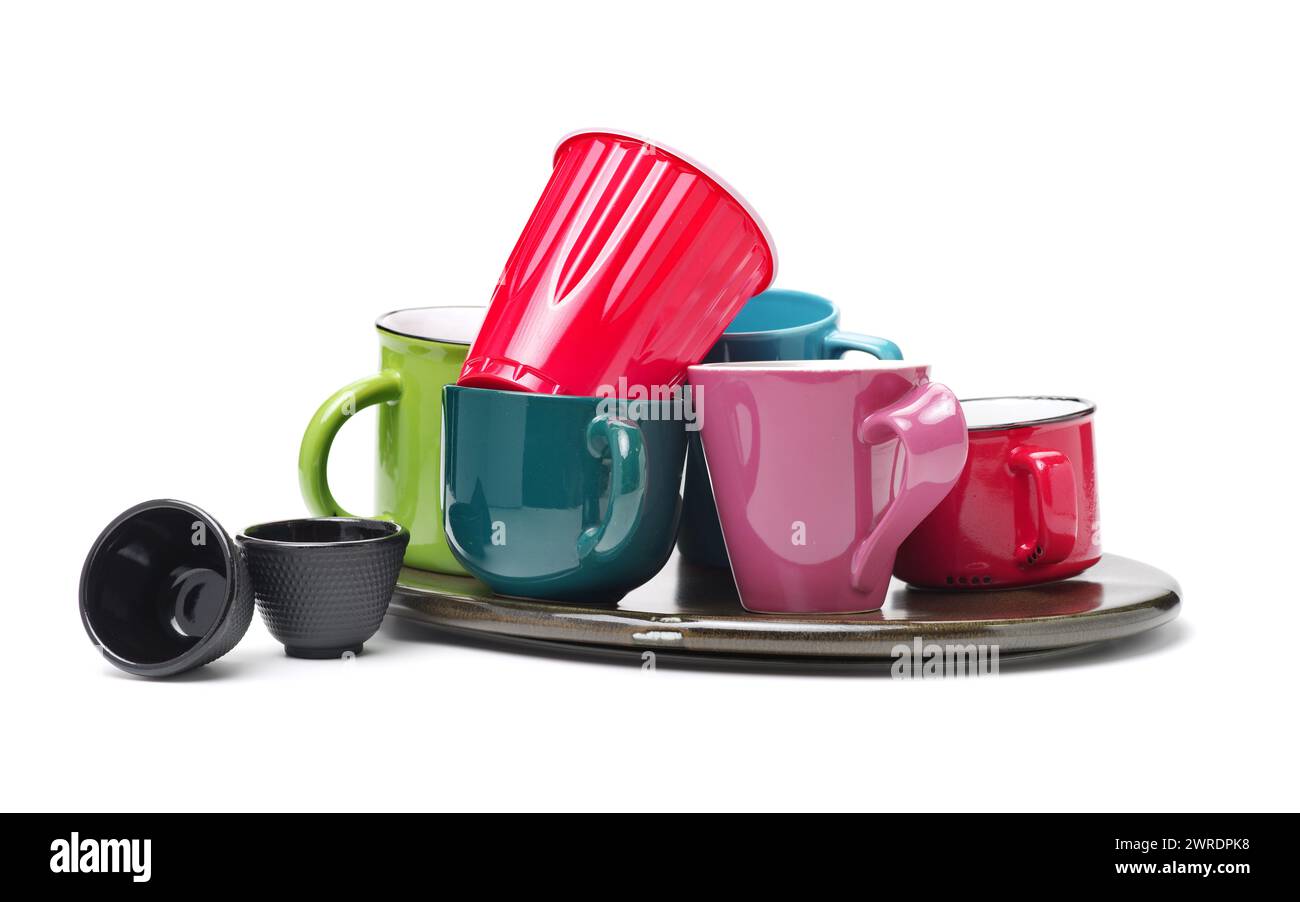 Colorful cups on white background Stock Photo - Alamy