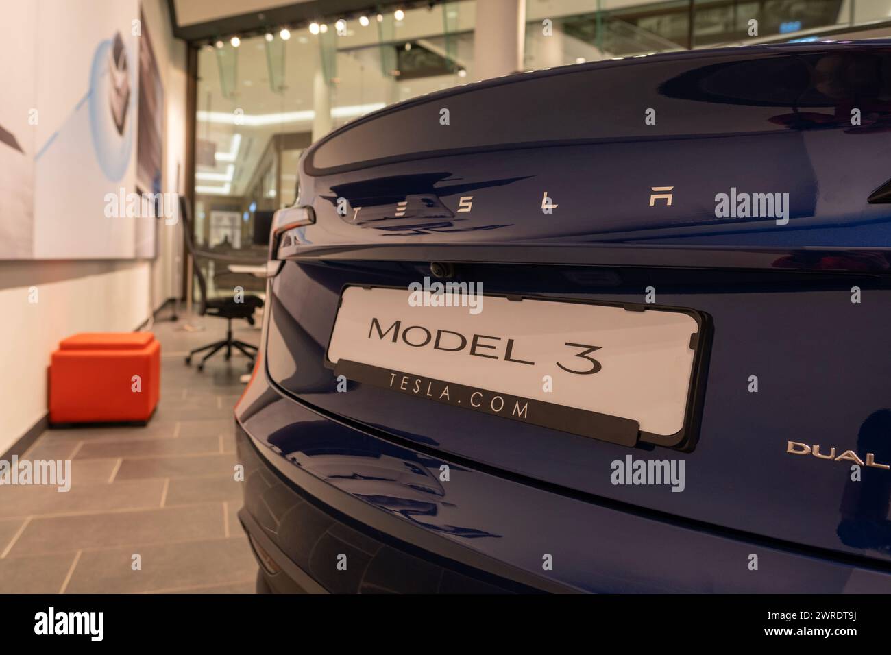 blue Tesla electric car model 3 in Studio, autopilot and eco-friendly ...