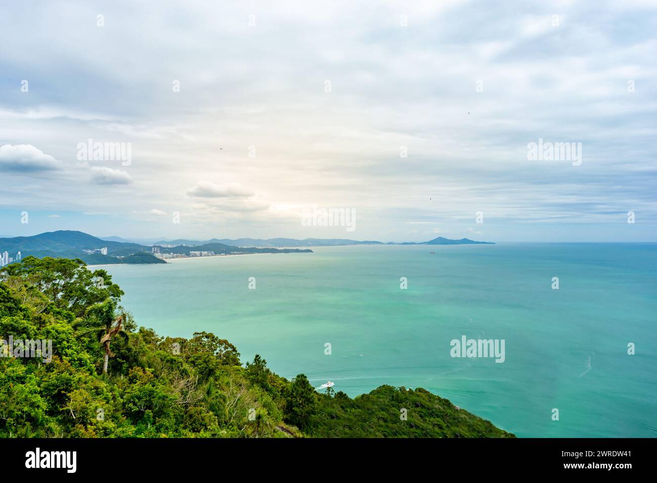 An aerial view of the coastal landscape in Brazil, capturing mountains ...