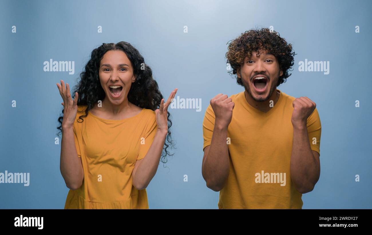 Excited happy shocked wonder amazed surprised Arabian couple winners ...