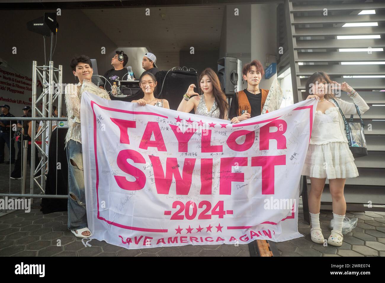 Taylor Swift's fan poses at the National Stadium on the first night of ...