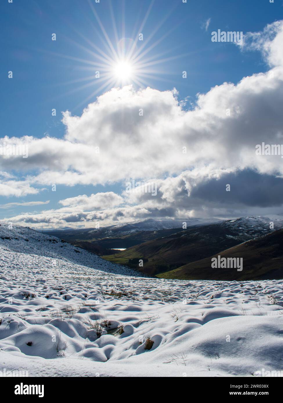 Sun shining over snow cover at the Wicklow Gap Stock Photo - Alamy