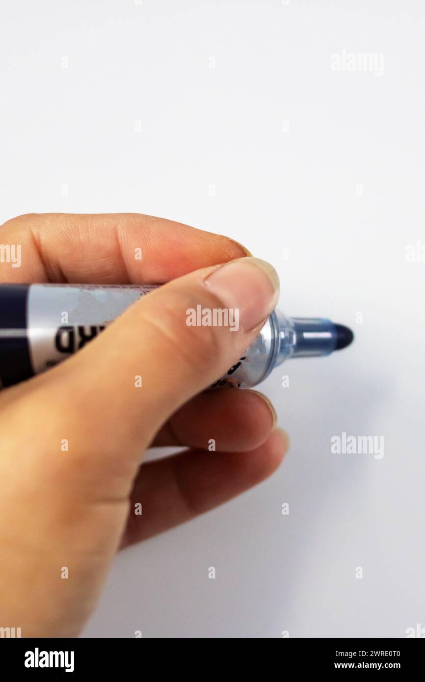 Hand with marker on whiteboard background close up Stock Photo - Alamy