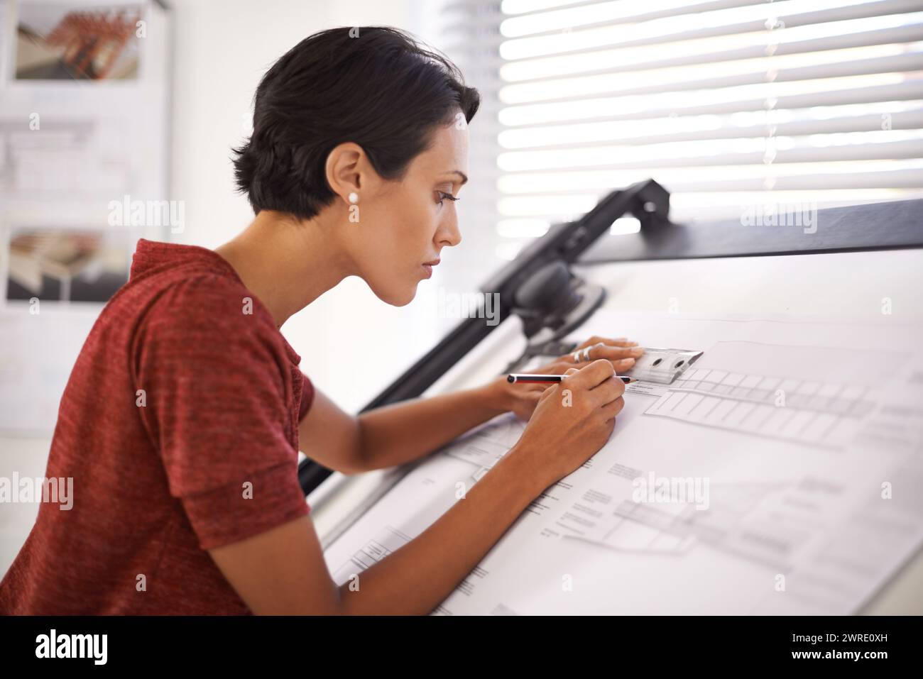 Woman, architecture with sketch and floor plan for construction, focus ...