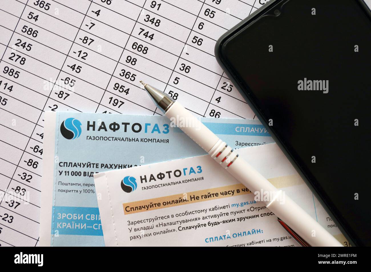 KYIV, UKRAINE - JULY 7, 2023 Naftogaz utility bill document with ...