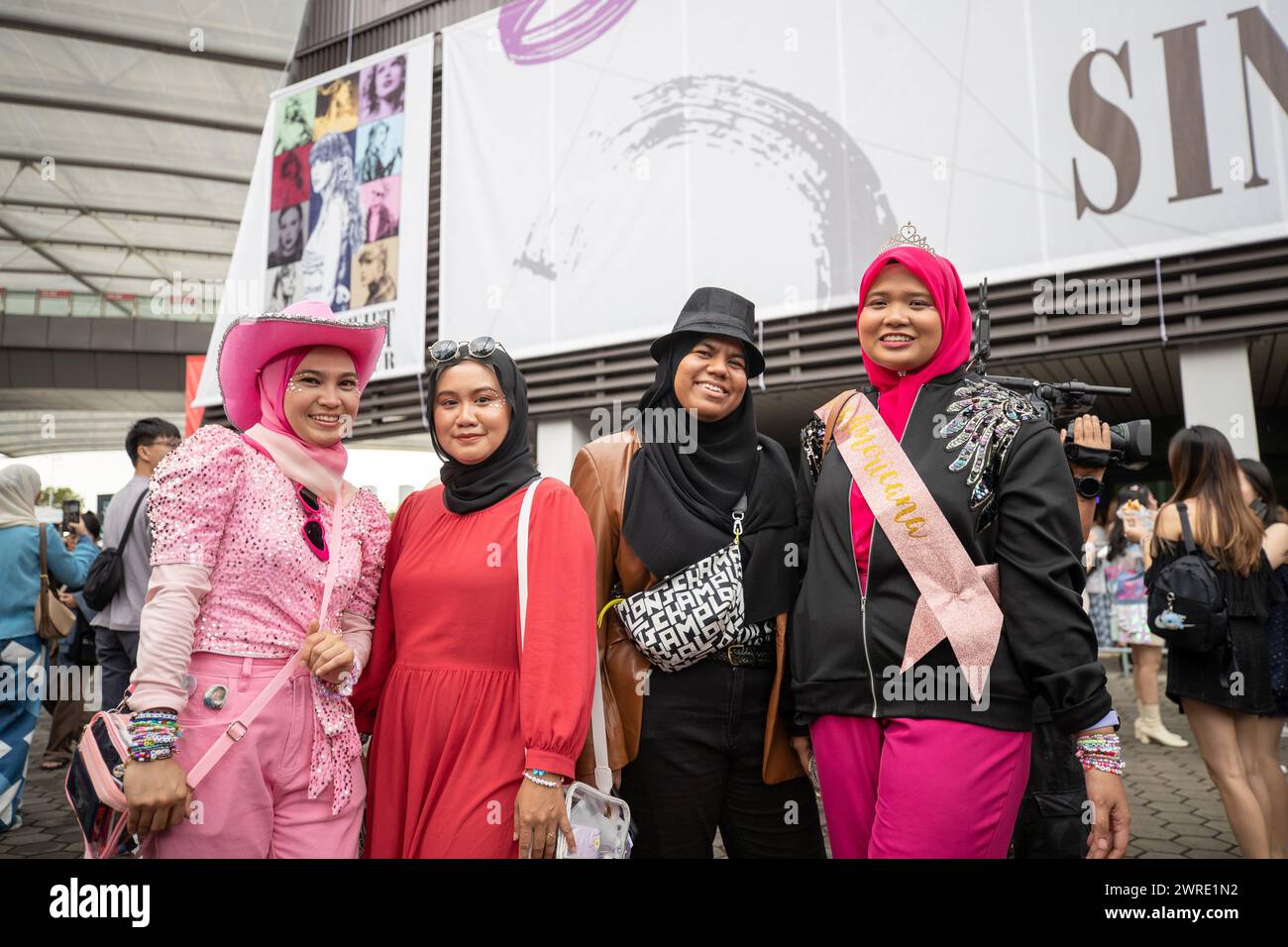 Taylor Swift's fan poses at the National Stadium on the first night of ...