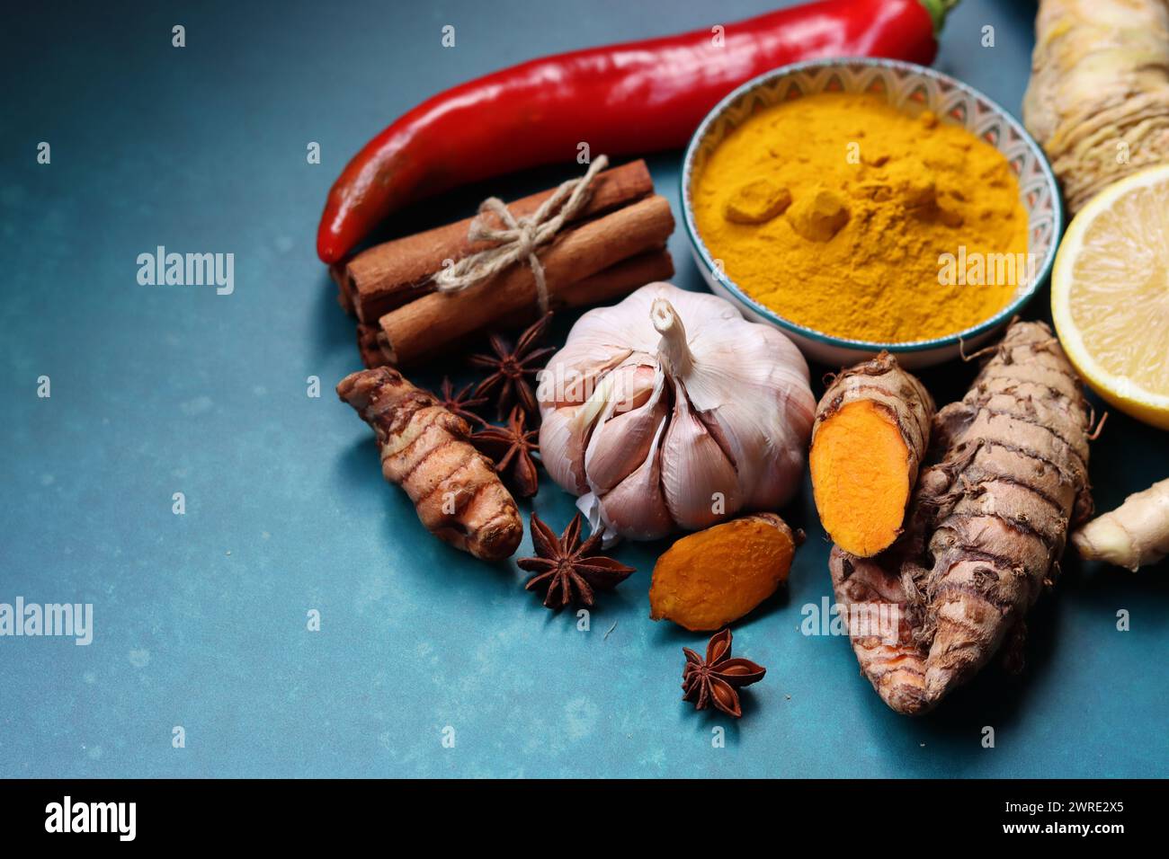 Homemade remedy ingredients top view photo. Ginger, lemon, cinnamon ...