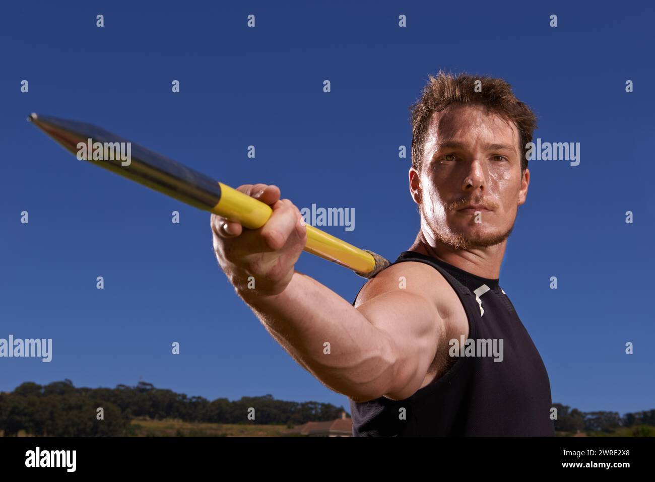 Portrait, javelin and man with fitness, training and blue sky with ...