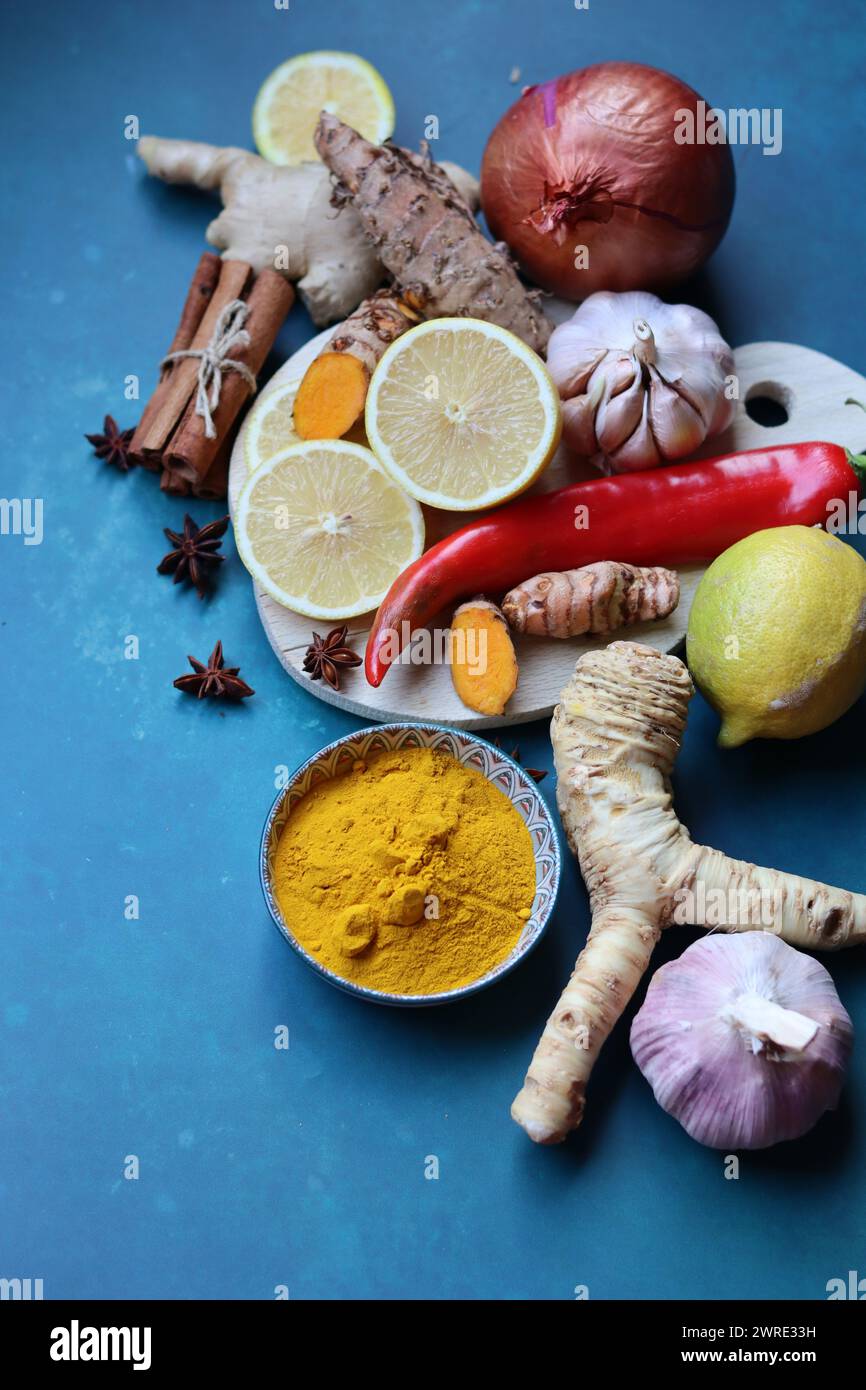 Boosting immune system concept. Herbal remedy ingredients on a table ...