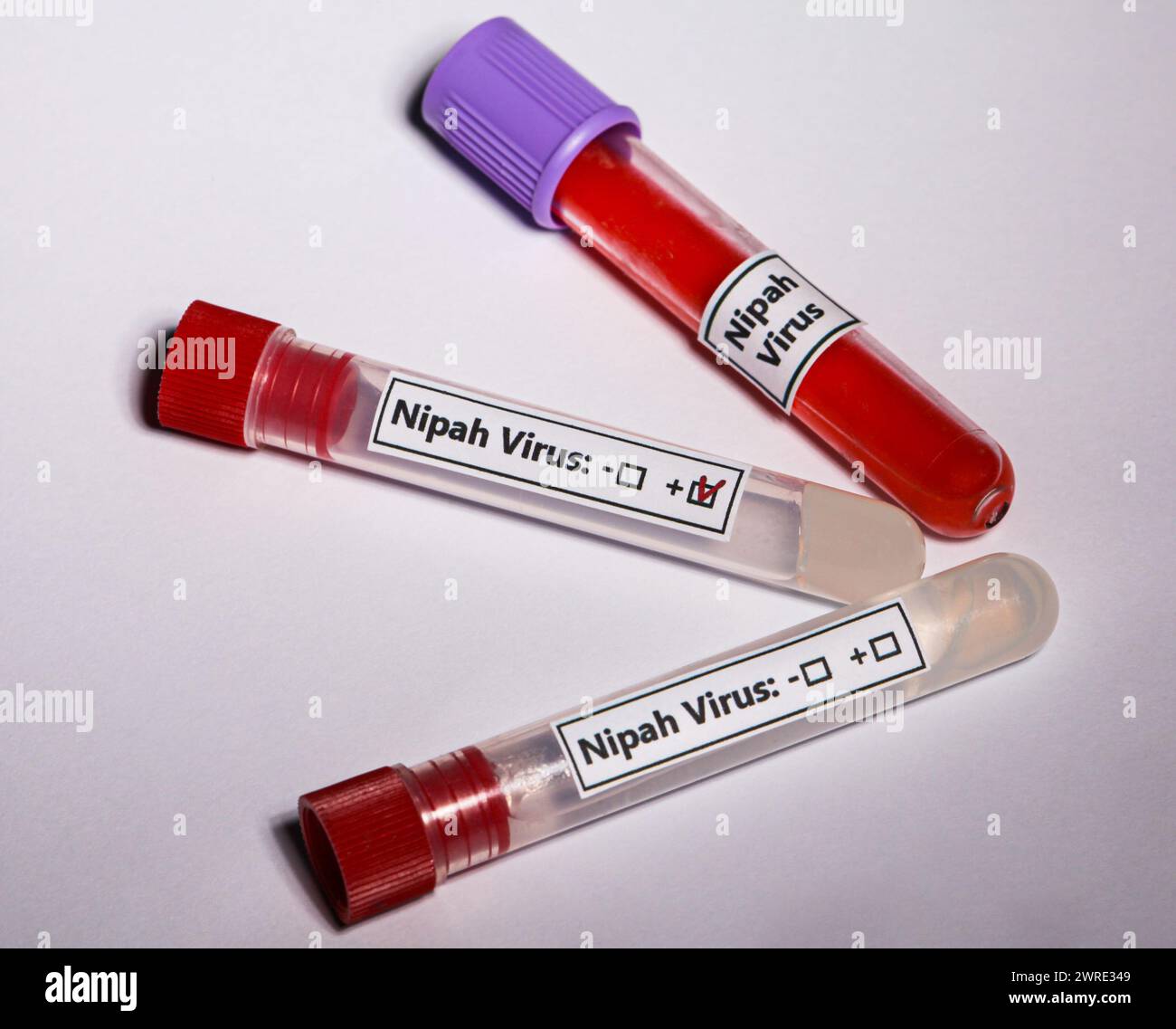 On a white background, three test tubes with the very widespread New ...