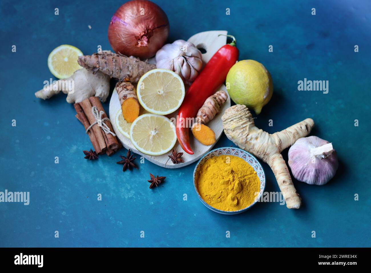 Homemade remedy ingredients top view photo. Ginger, lemon, cinnamon ...