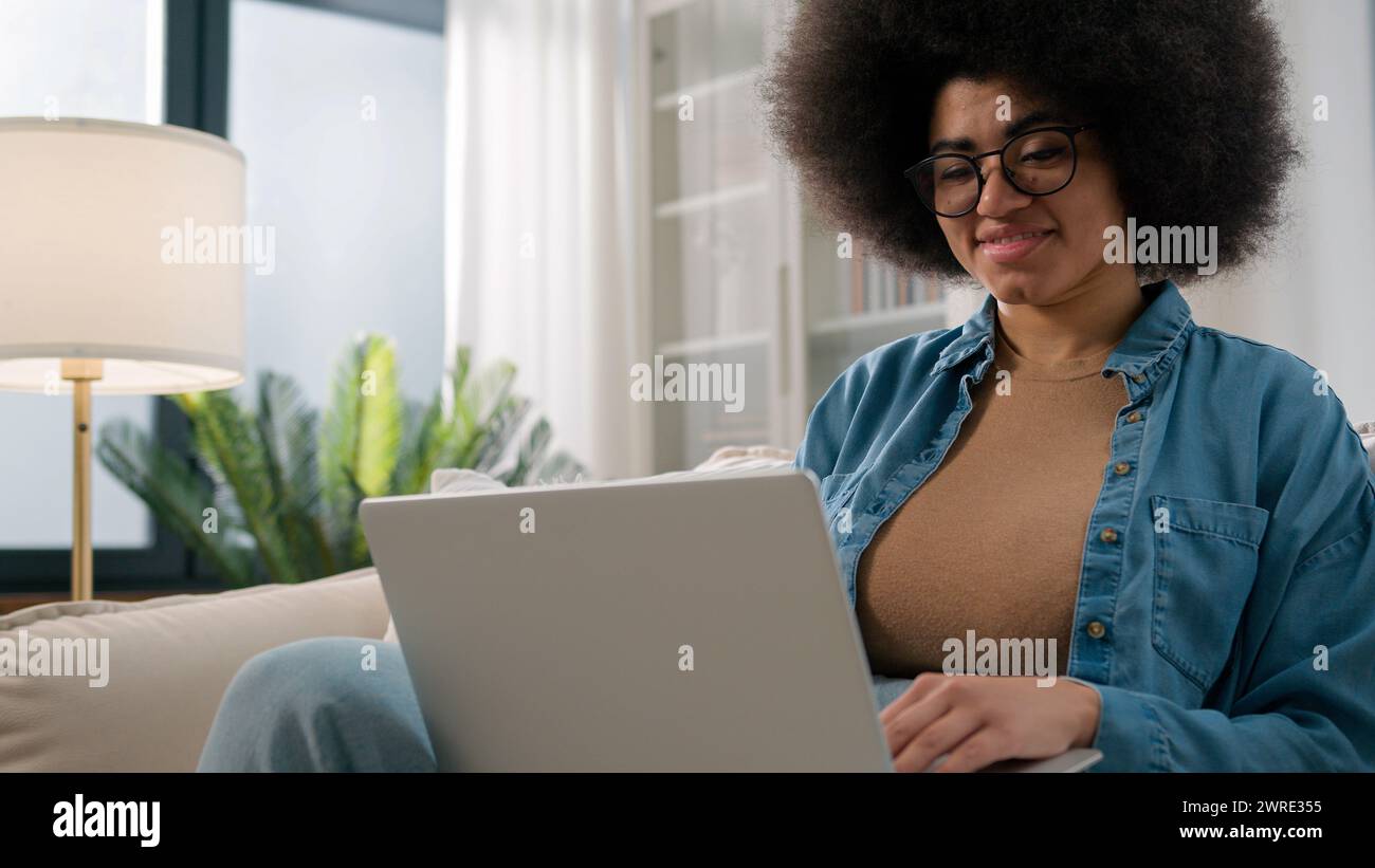 Woman working laptop pc sitting hi-res stock photography and images - Alamy