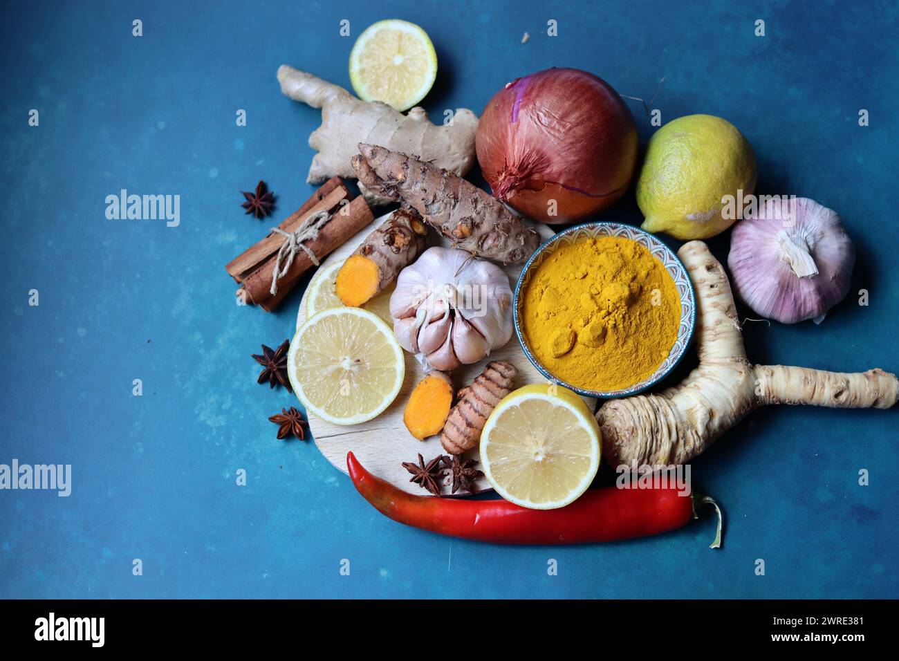Homemade remedy ingredients top view photo. Ginger, lemon, cinnamon ...