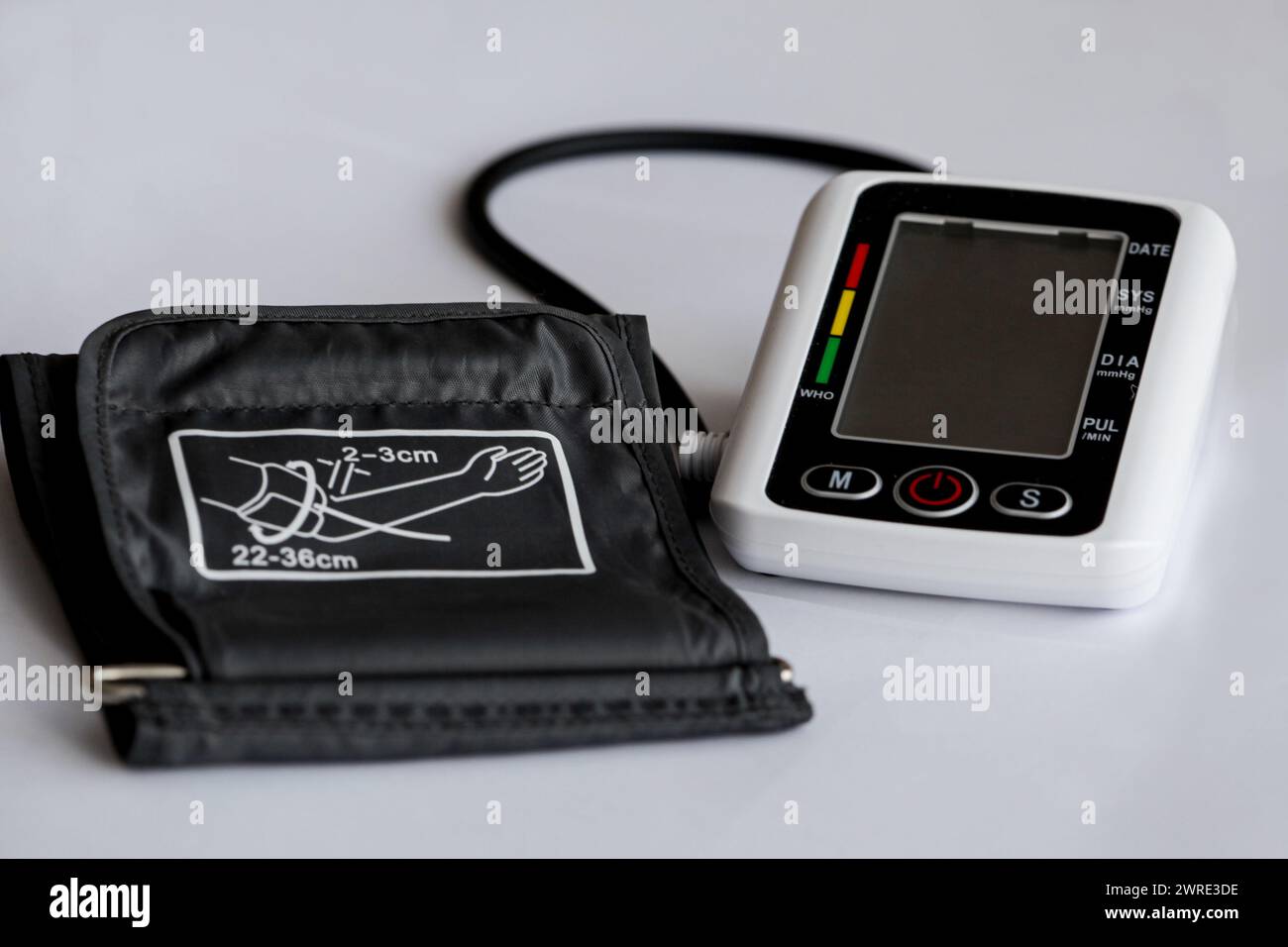 Blood pressure measuring device, tonometer on white medical background ... Blood pressure measuring device, tonometer on white medical background ...