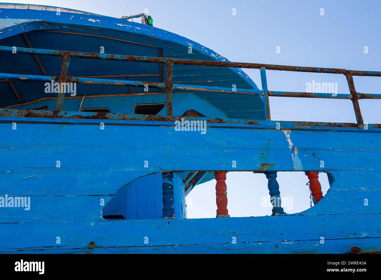 Superstructure detail of an abandoned and rotting old trawler moored in ...