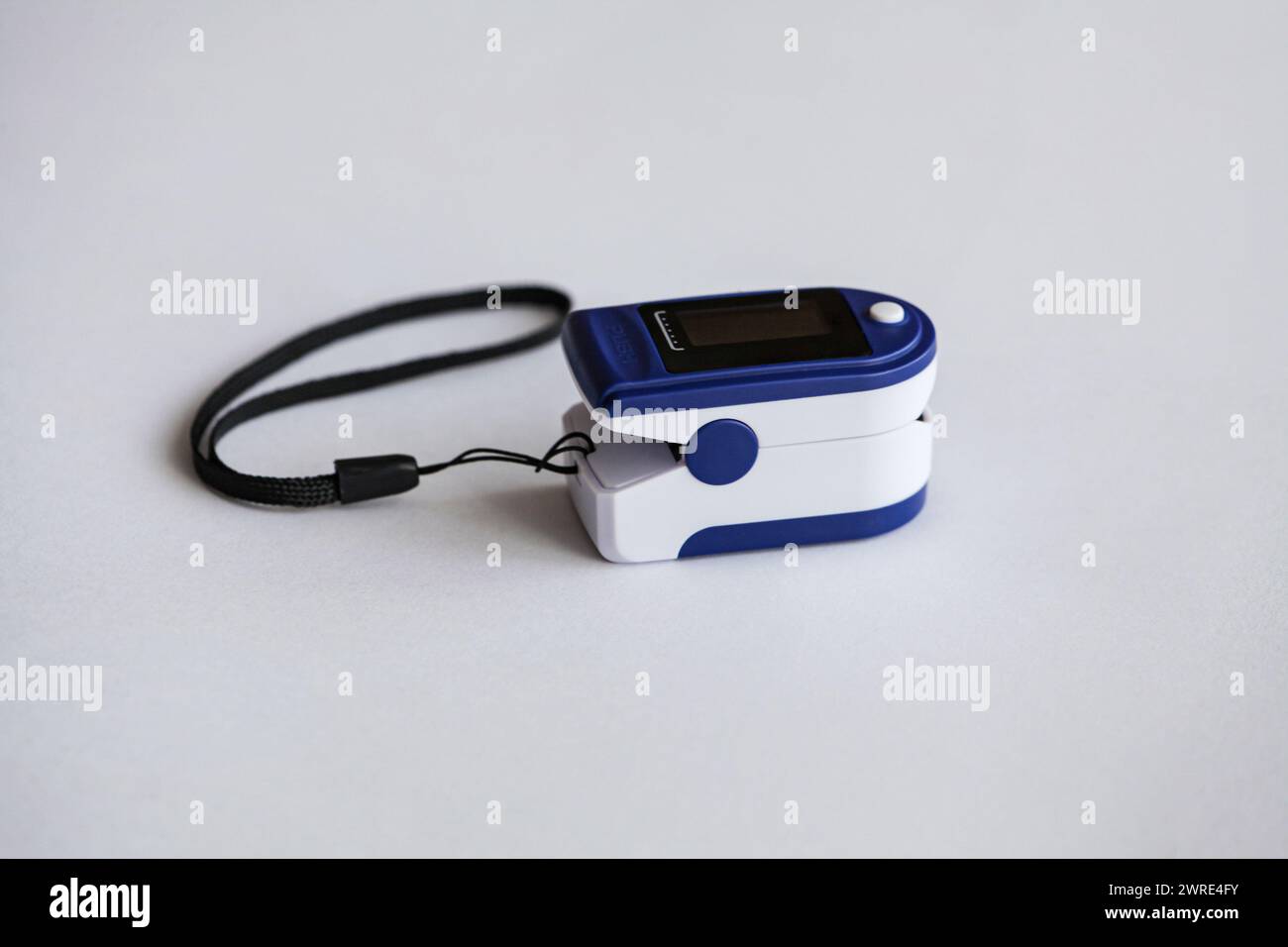 Portable Pulse oximeter isolated on white background Stock Photo - Alamy