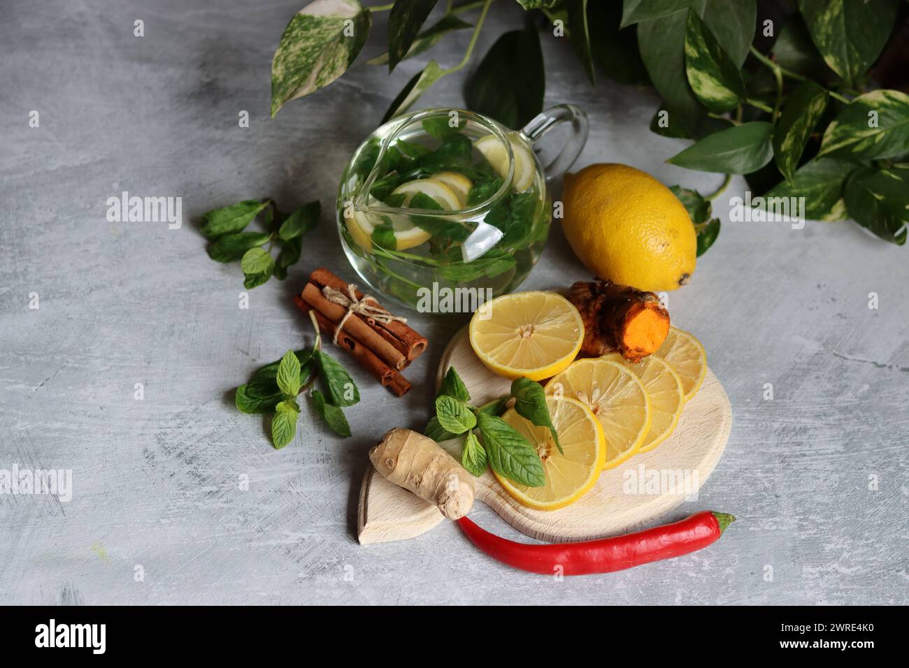 Lemons and mint leaves. Still life with organic fruit. Eating healthy ...