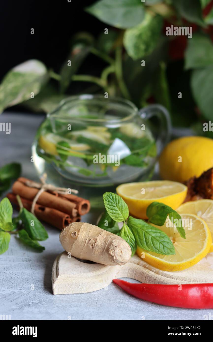 Lemons and mint leaves. Still life with organic fruit. Eating healthy ...