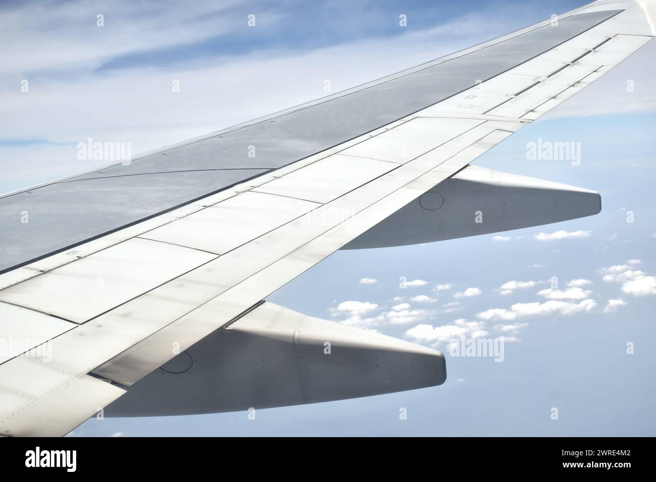 plane wing and cloud background on sky through window frame Stock Photo ...
