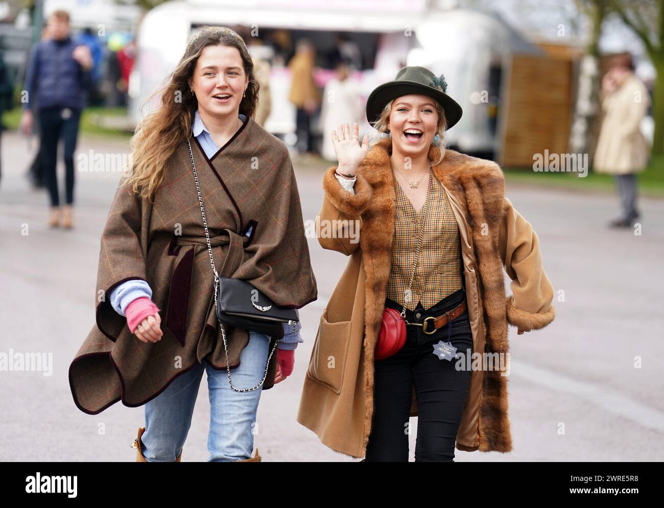 Racegoers arriving on day one of the 2024 Cheltenham Festival at ...