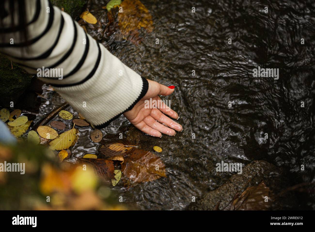 The picture of how a young lady wants to steal water from a lake where ...