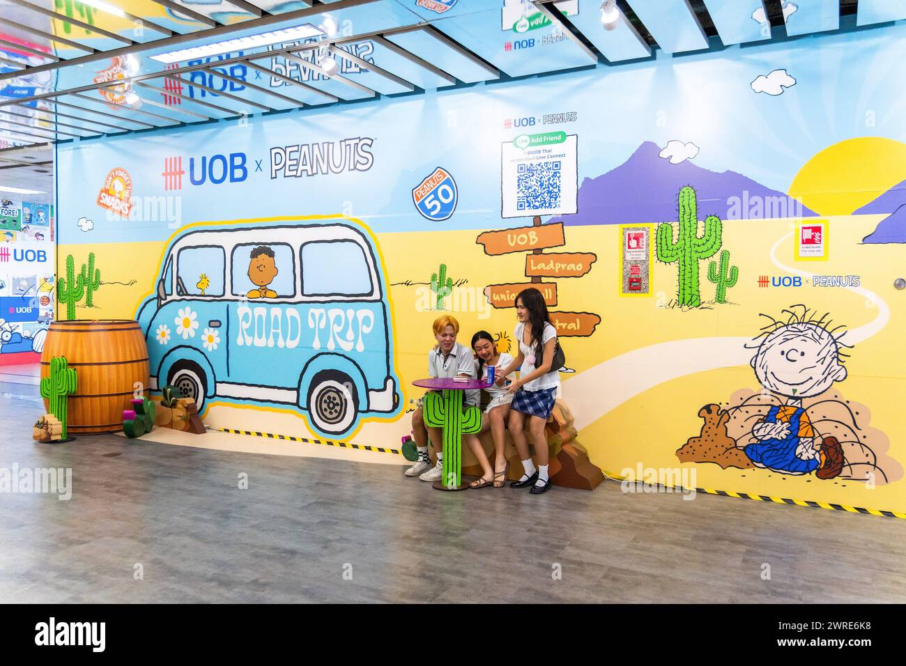 A group of young Thai citizens is seen relaxing at a corner area of Snoopy and Friends Art ...