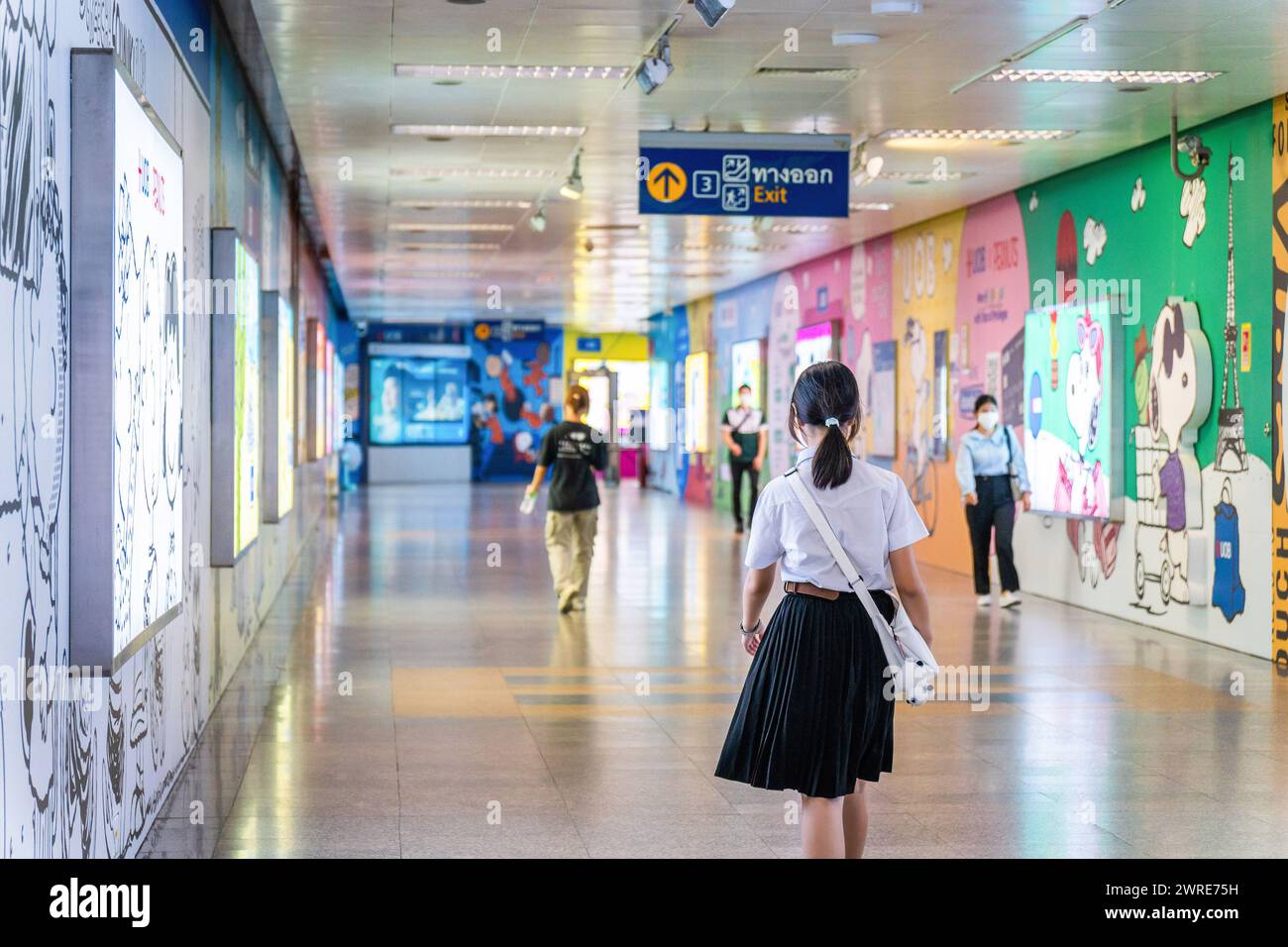 Bangkok, Thailand. 11th Mar, 2024. Subway passengers are seen walking through the Snoopy and ...