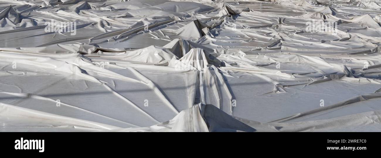Collapsed canvas dome of the stadium background Stock Photo - Alamy
