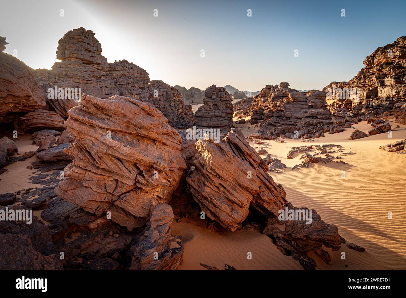Tadrart landscape in the Sahara desert, Algeria. Blocks of red ...