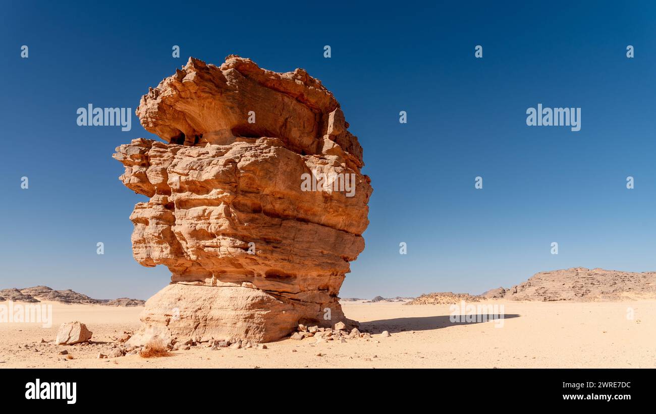 Tadrart landscape in the Sahara desert, Algeria. A block of sandstone ...