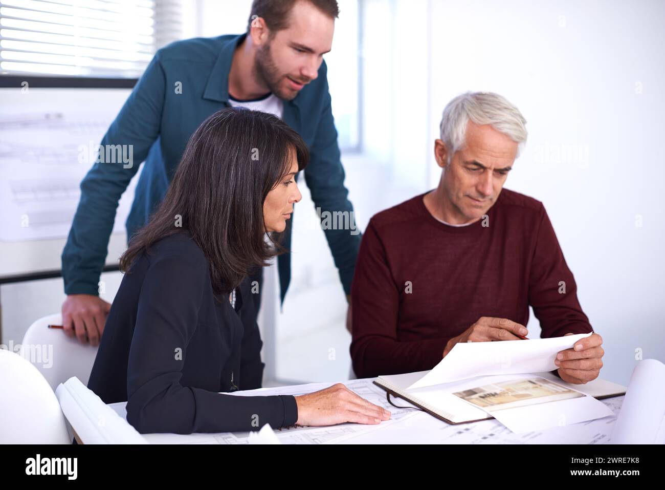 Architects, meeting and planning with blueprint, teamwork and ...