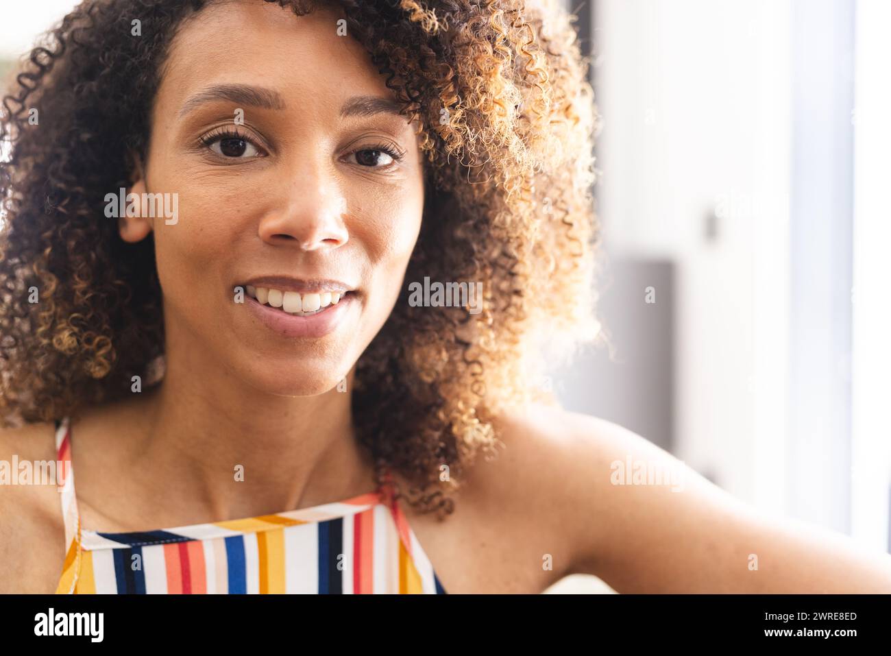 Relaxed young woman afro hair hi-res stock photography and images - Alamy
