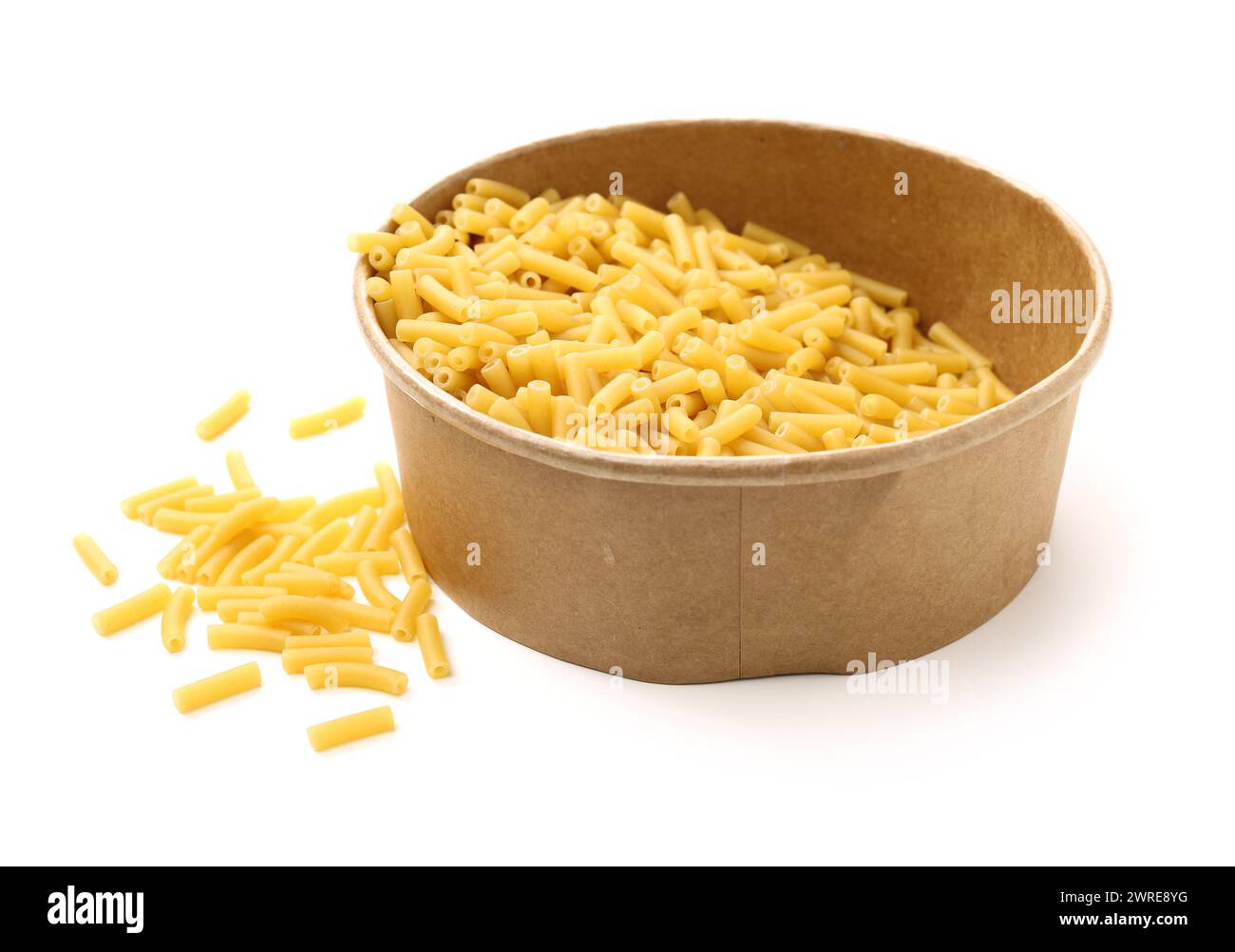 Italian pasta (Gomiti Rigati) on white background Stock Photo - Alamy