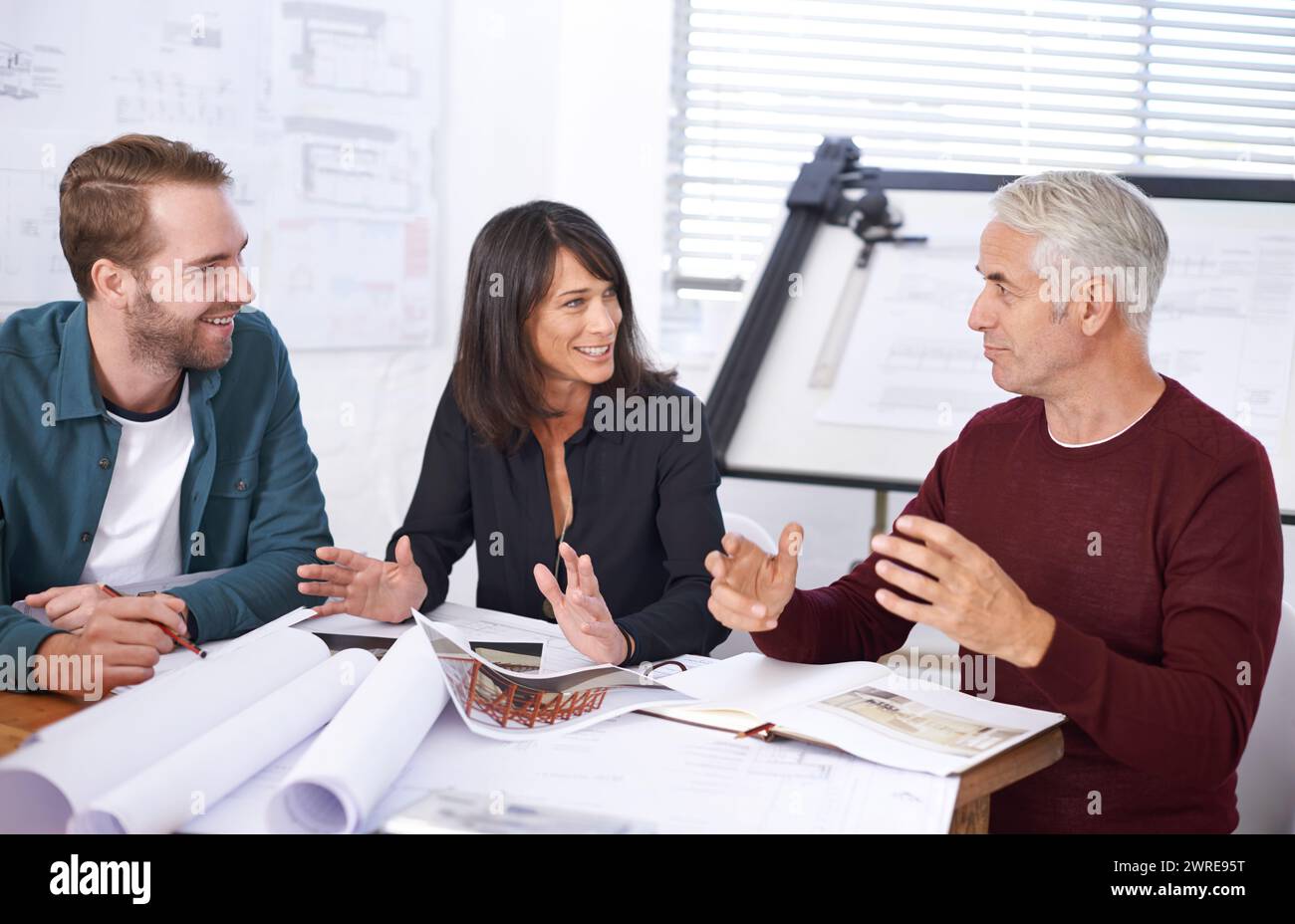 Architecture, planning and business people in consultation with ...