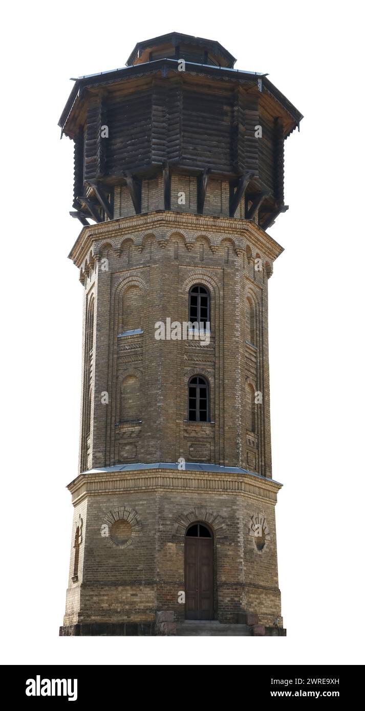 The old city water tower is made of yellow bricks and wood. Isolated on ...