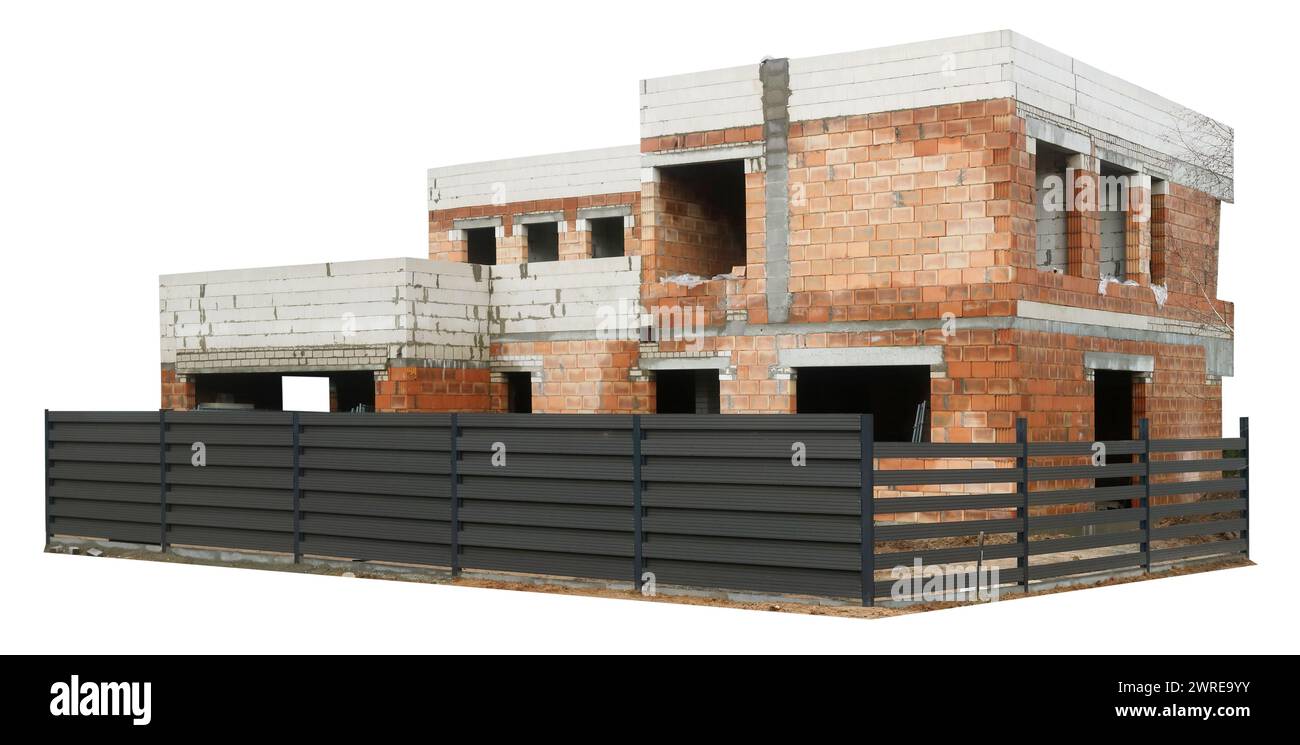 Unfinished building of a red brick rural house. Isolated on white Stock ...