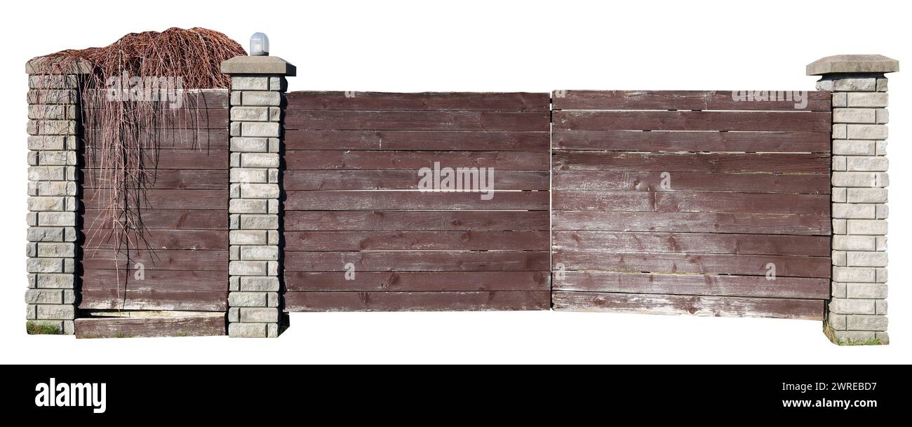 Old aged ence made of bricks and boards. Isolated on white Stock Photo ...