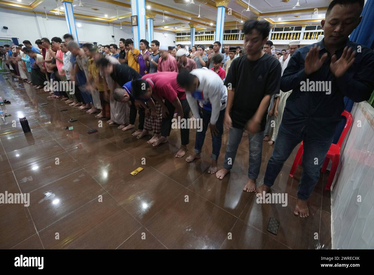 Muslims are performing the first 'Tarawih' prayer at the beginning of ...