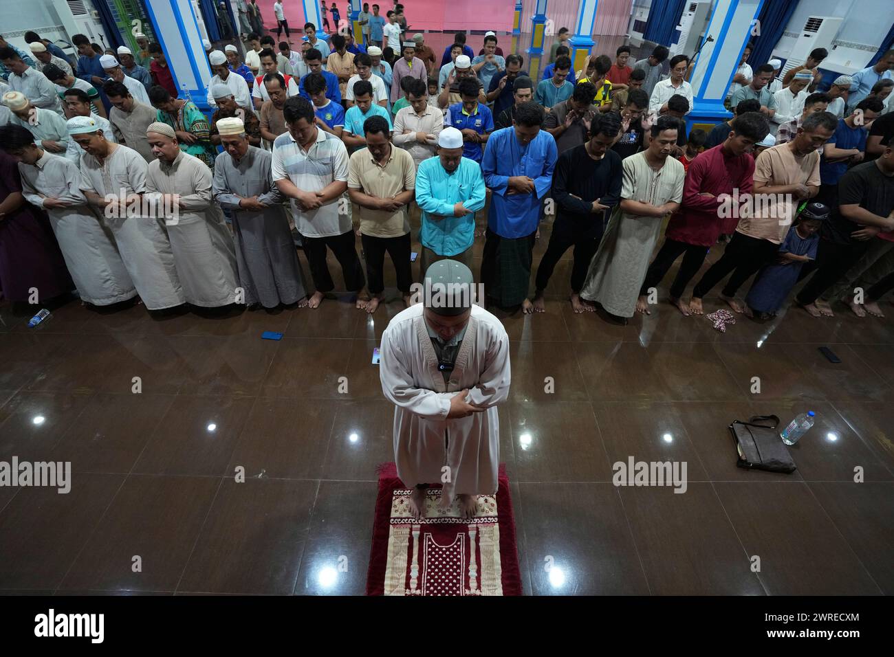 Muslims are performing the first 'Tarawih' prayer at the beginning of ...