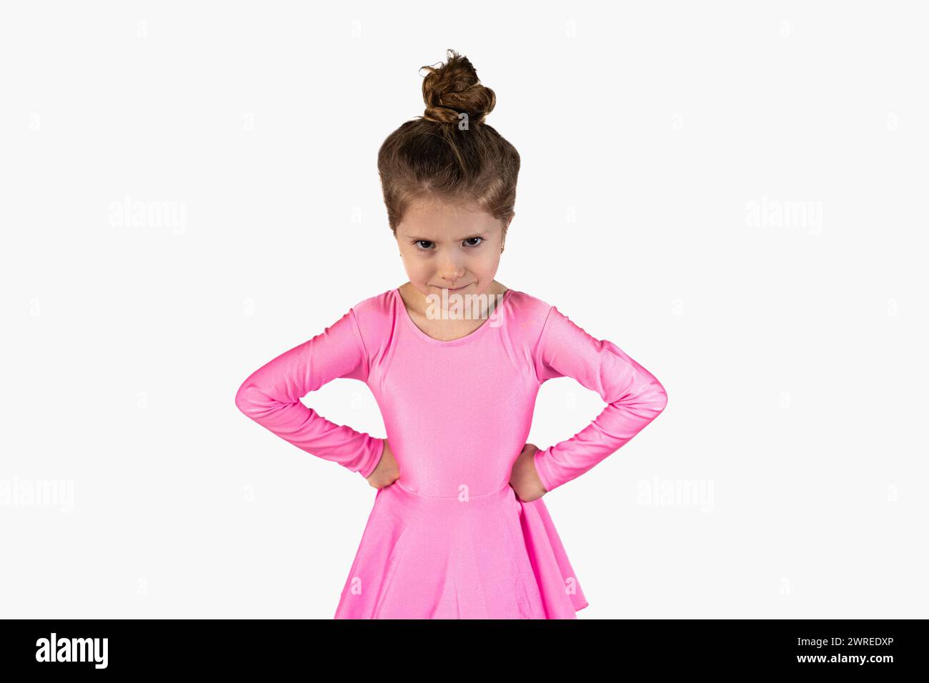 Portrait of an unhappy, angry and annoyed ballerina girl dressed in a ...