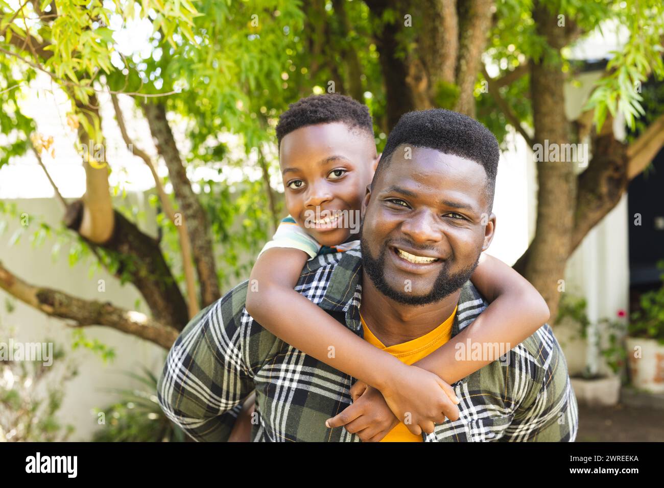 African american boy hugs hi-res stock photography and images - Alamy