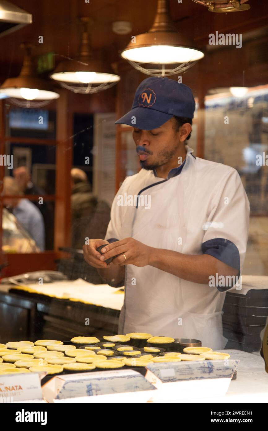 Chef expertly prepares mouthwatering dishes in bustling restaurant ...