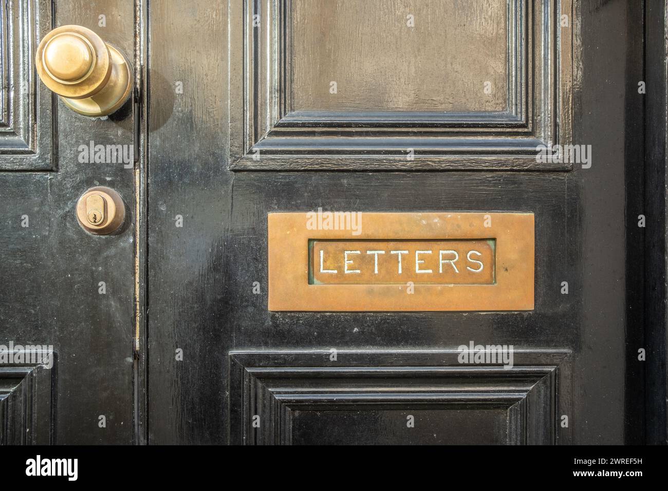 Grand front door and letterbox with word 'Letter' engraved Stock Photo ...