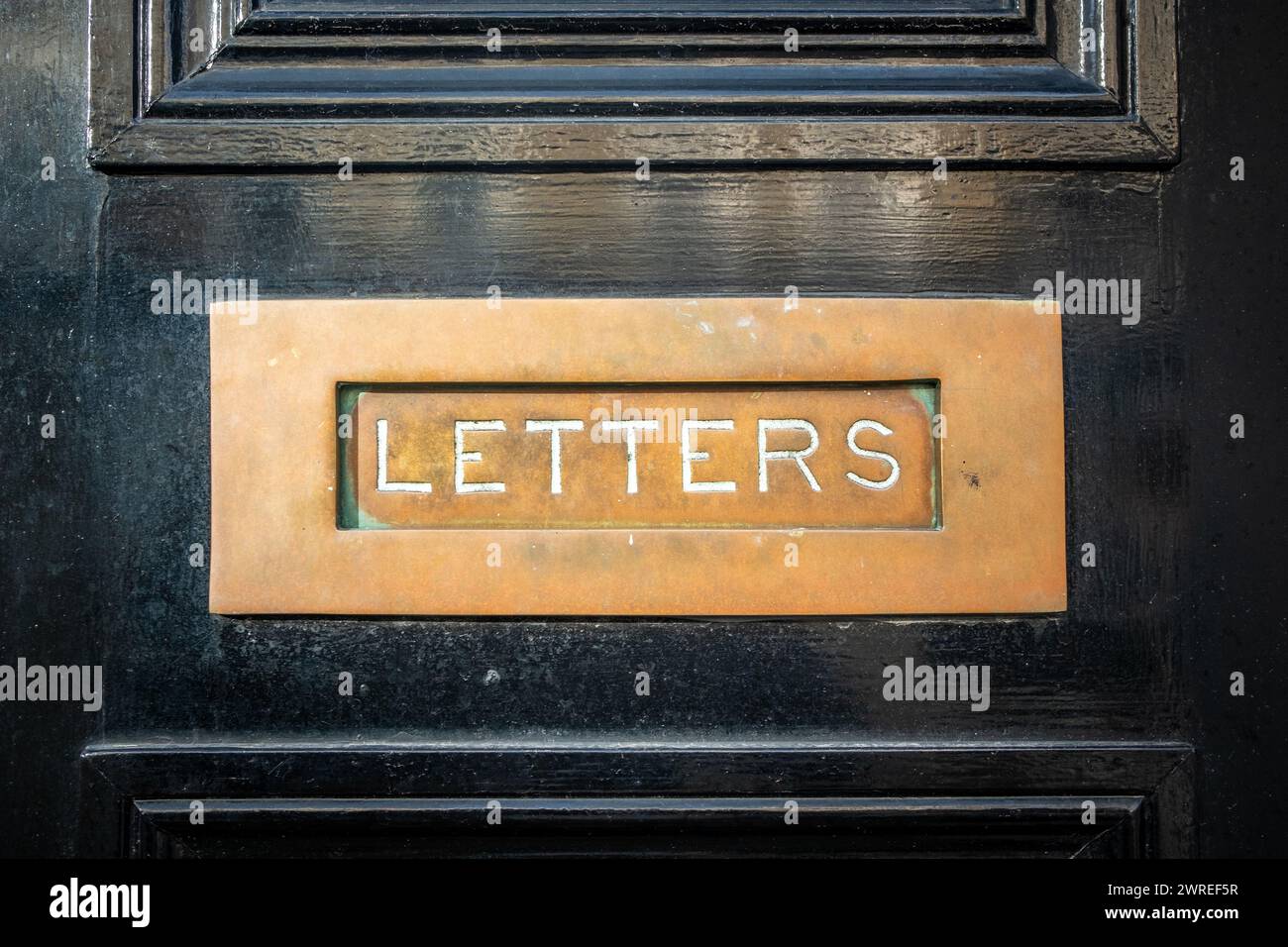 Grand front door and letterbox with word 'Letter' engraved Stock Photo ...