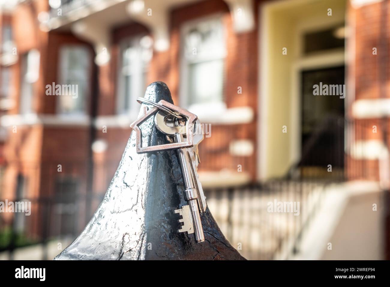 Typical red brick British house with house keys in foreground Stock ...