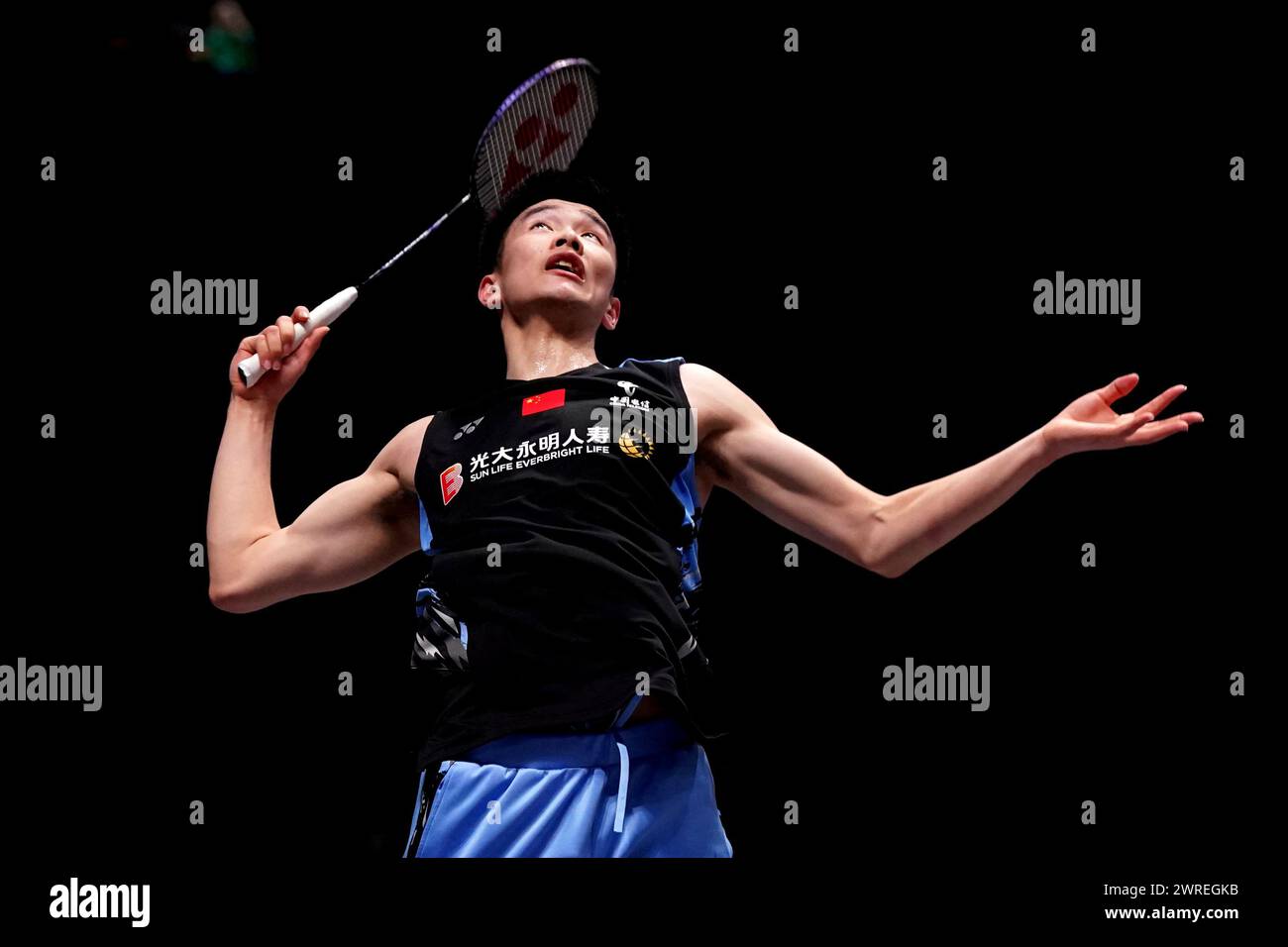 China's Li Shifeng in action against France's Toma Junior Popov in a ...