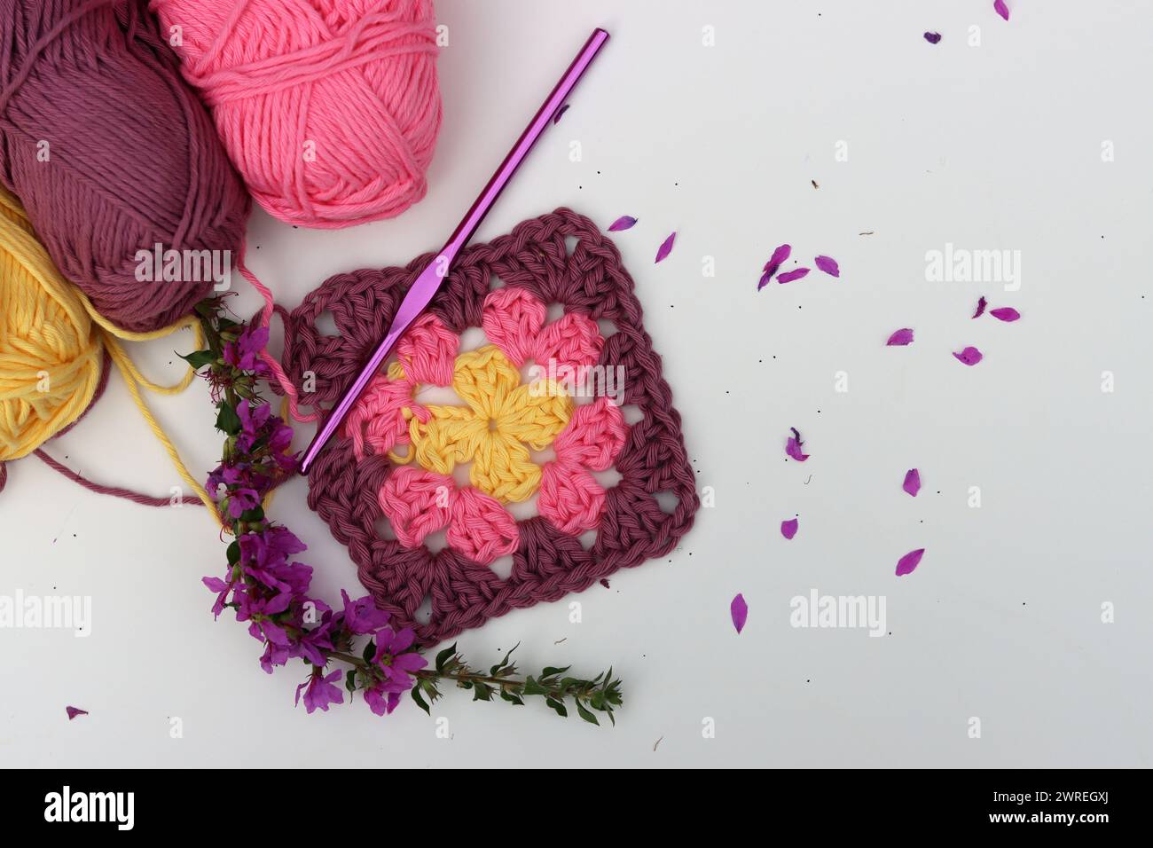 Pink crocheting. Handmade ornament made of organic pink yarn. White ...