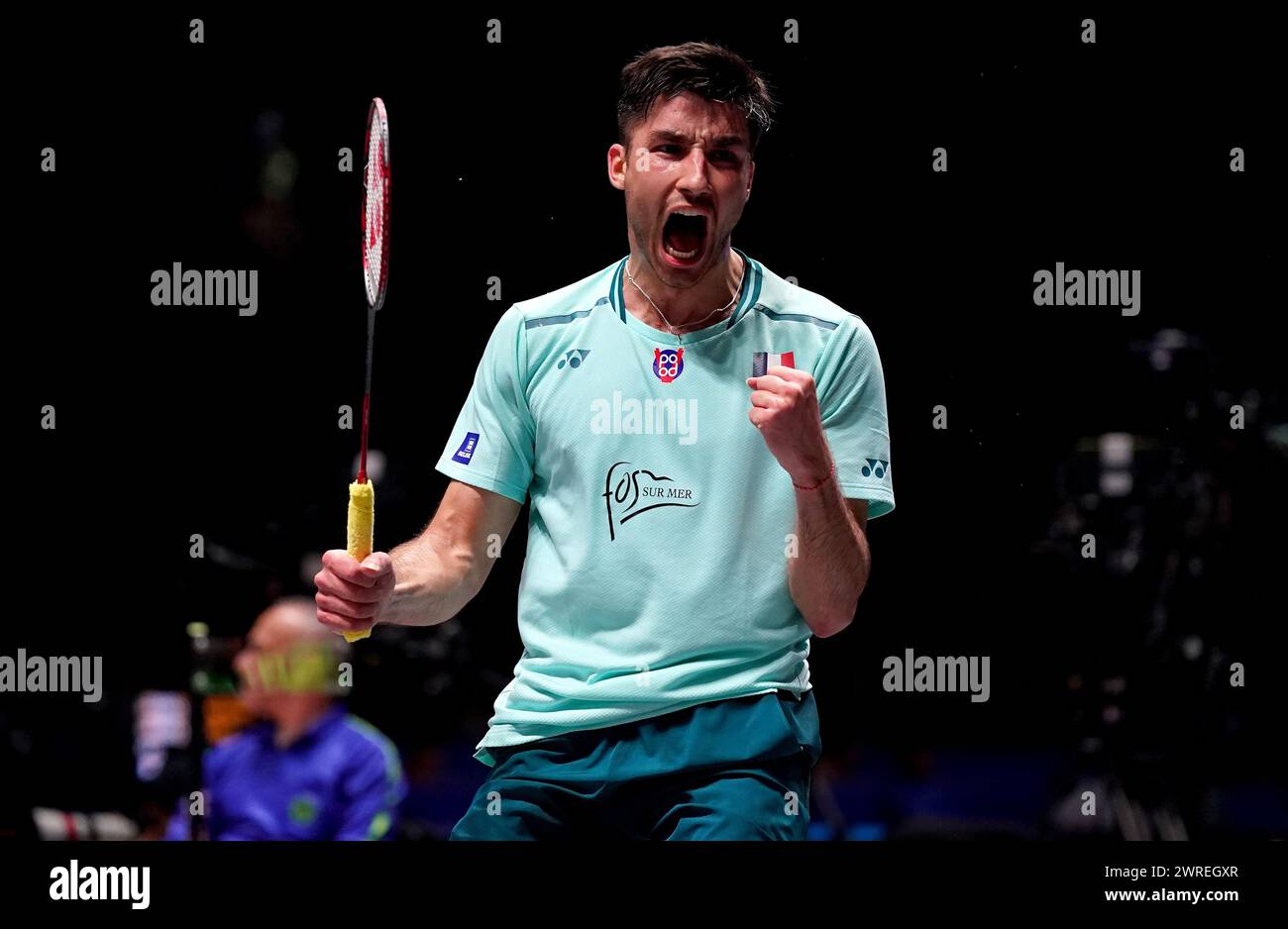 France's Toma Junior Popov celebrates victory against China's Li ...